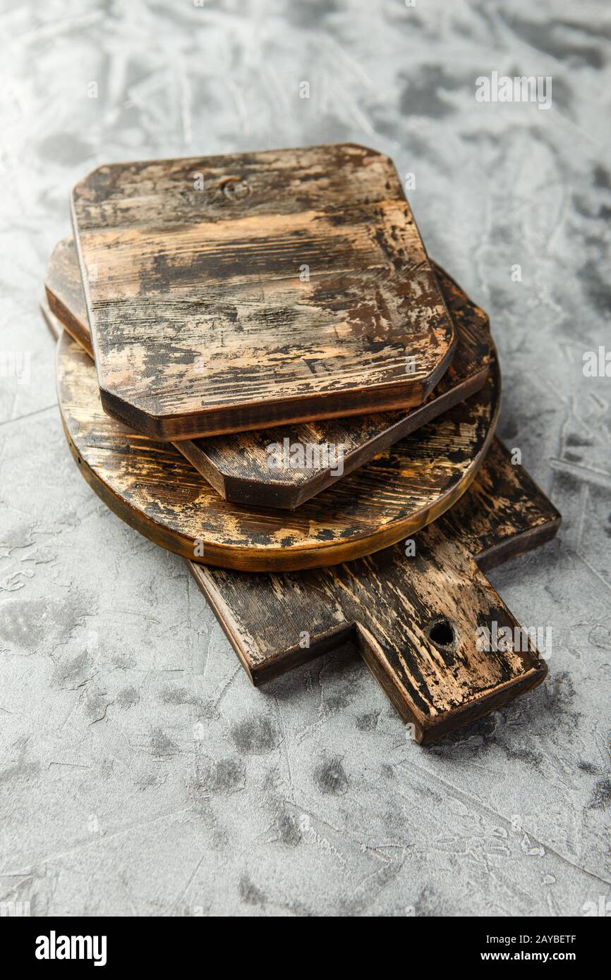 Set of different old wooden chopping boards Stock Photo - Alamy