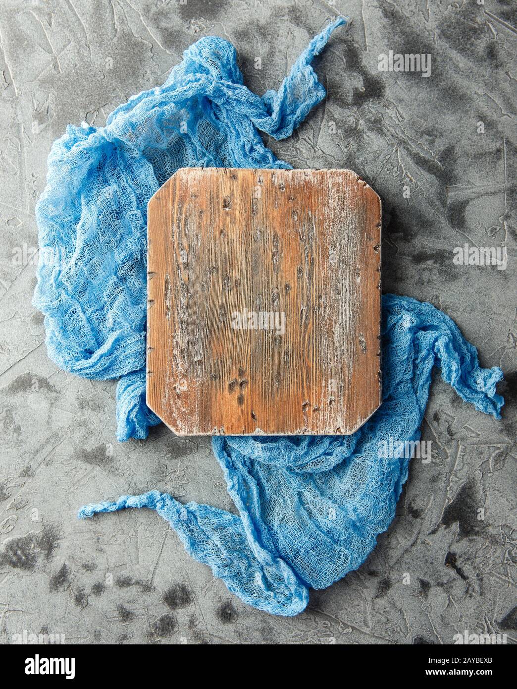 Cutting board over metal table background. Cooking backdrop. Top view ...