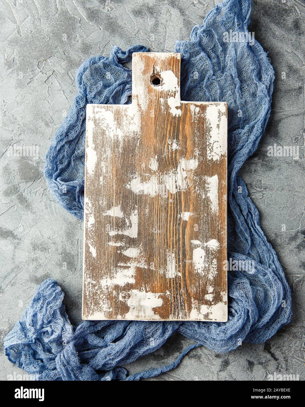 Cutting board over metal table background. Cooking backdrop. Top view ...