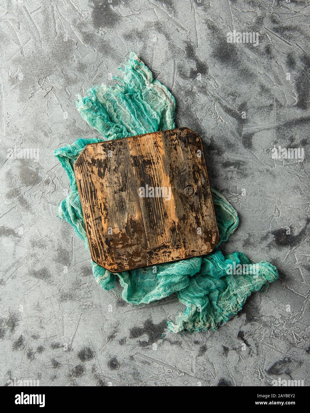 Cutting board over metal table background. Cooking backdrop. Top view ...