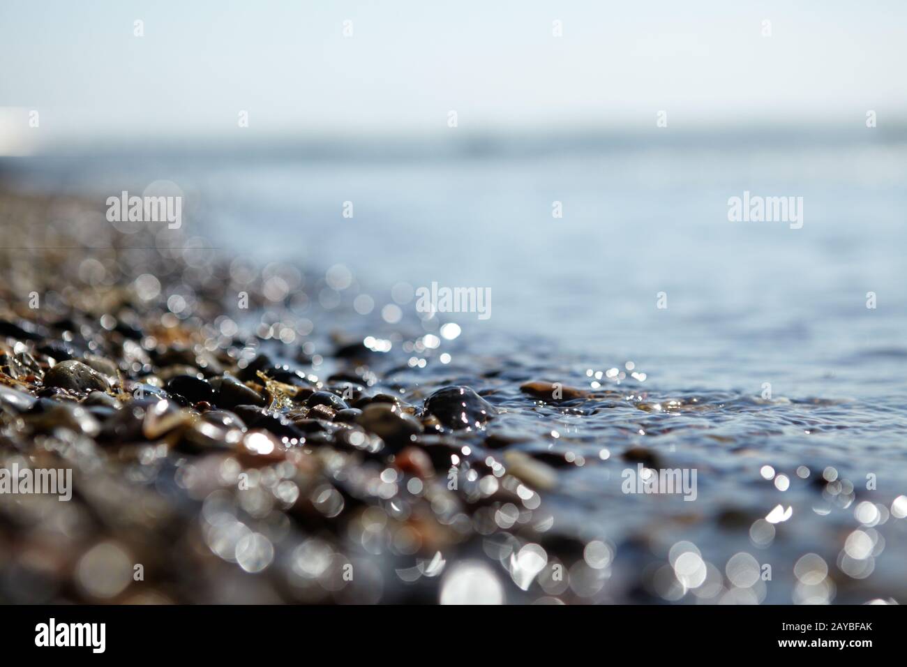 Blue water on pebbles hi-res stock photography and images - Alamy