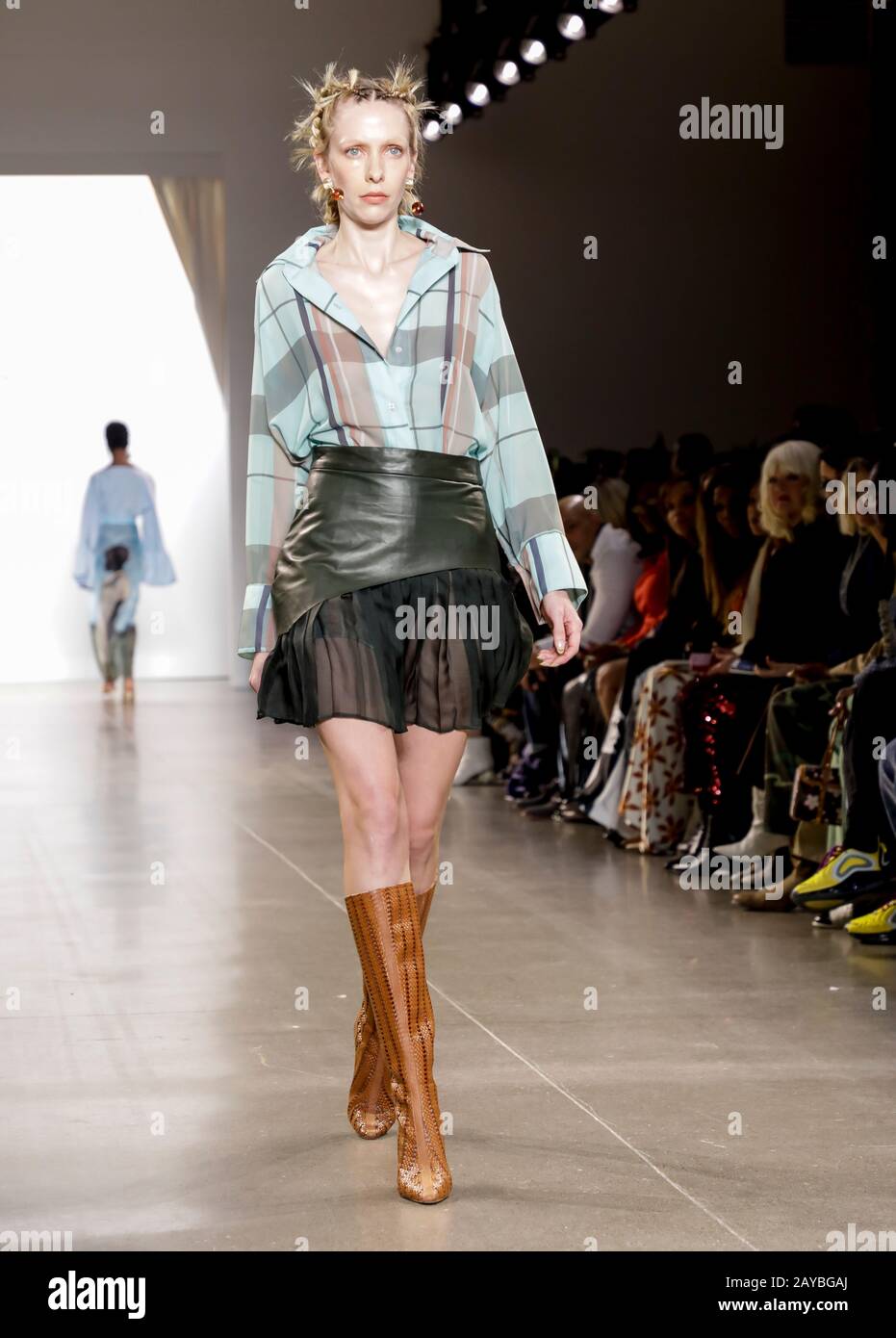 New York, NY, USA - February 12, 2020: A model walks runway for Fe Noel ...