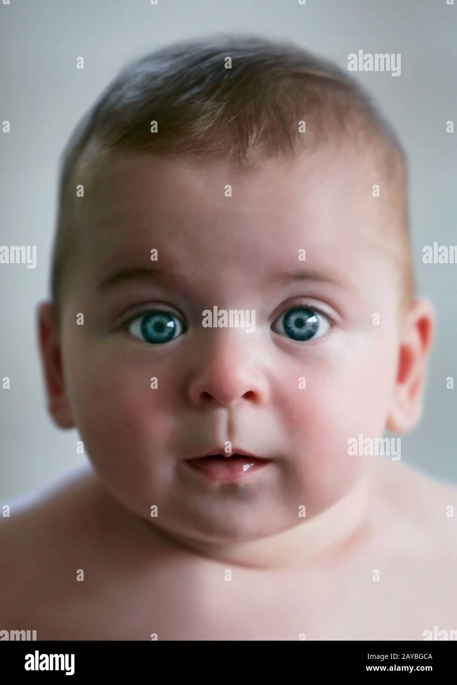 Surprised baby boy Stock Photo - Alamy