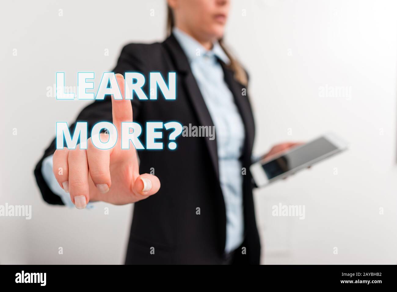 Conceptual hand writing showing Learn More question. Business photo ...