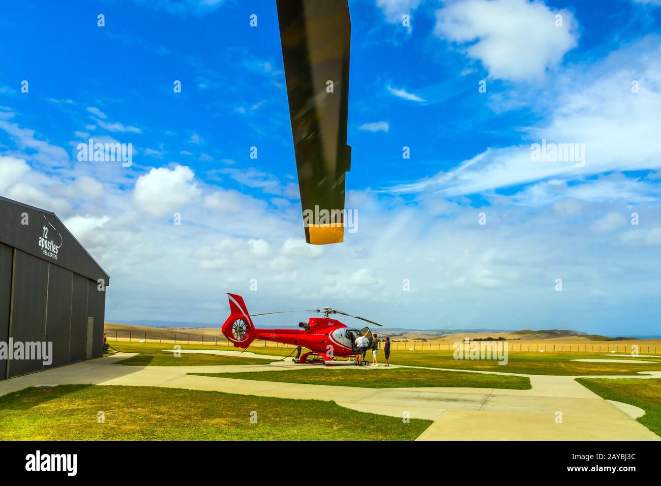 Red beautiful helicopter ready for flight Stock Photo - Alamy