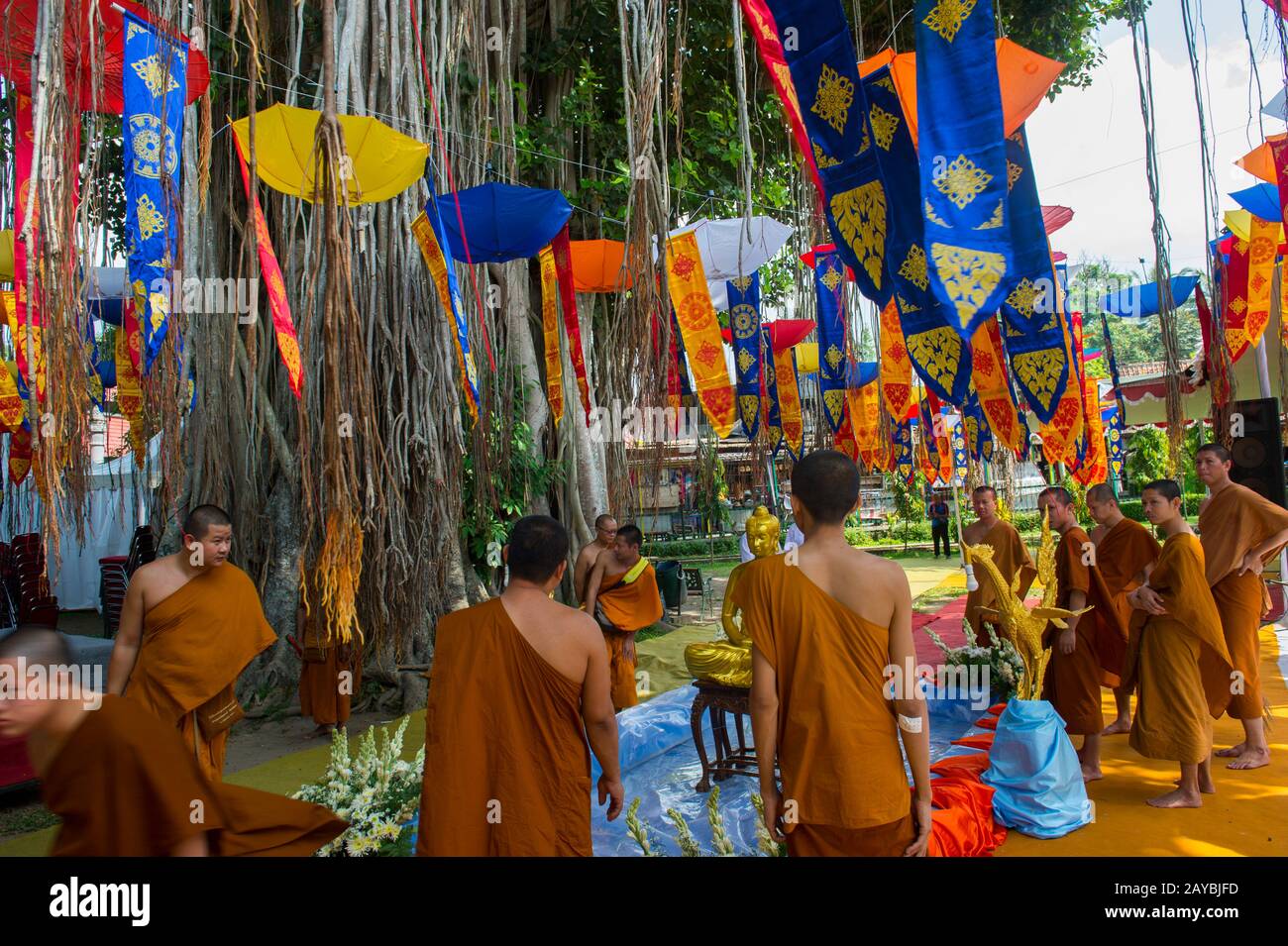Buddhist monks preparing for the Buddhist full moon celebration at the ...