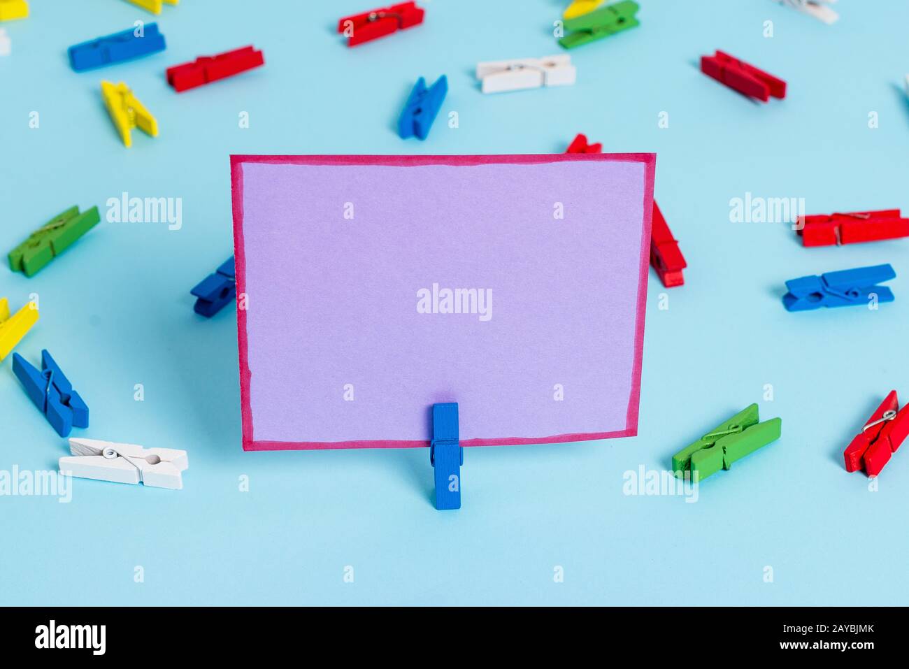 Colored clothespin placed around the empty rectangle square shaped ...