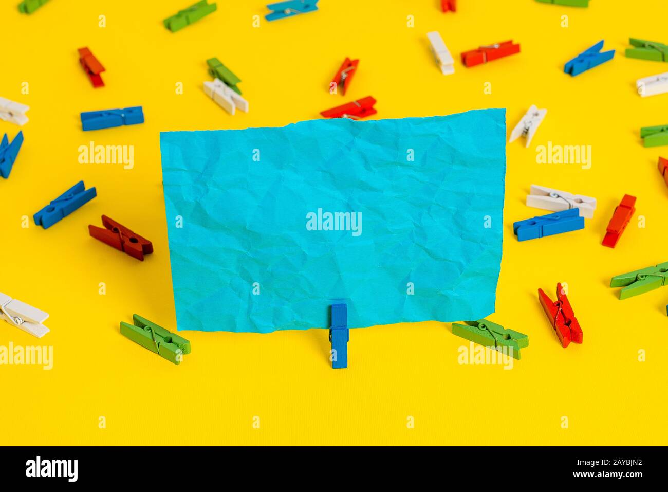 Colored clothespin placed around the empty rectangle square shaped ...