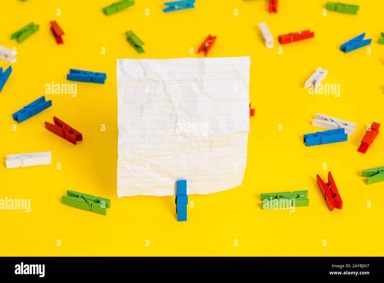 Colored clothespin placed around the empty rectangle square shaped ...