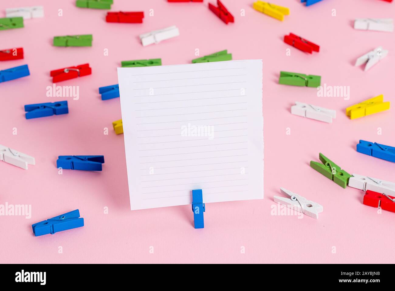 Colored clothespin placed around the empty rectangle square shaped ...