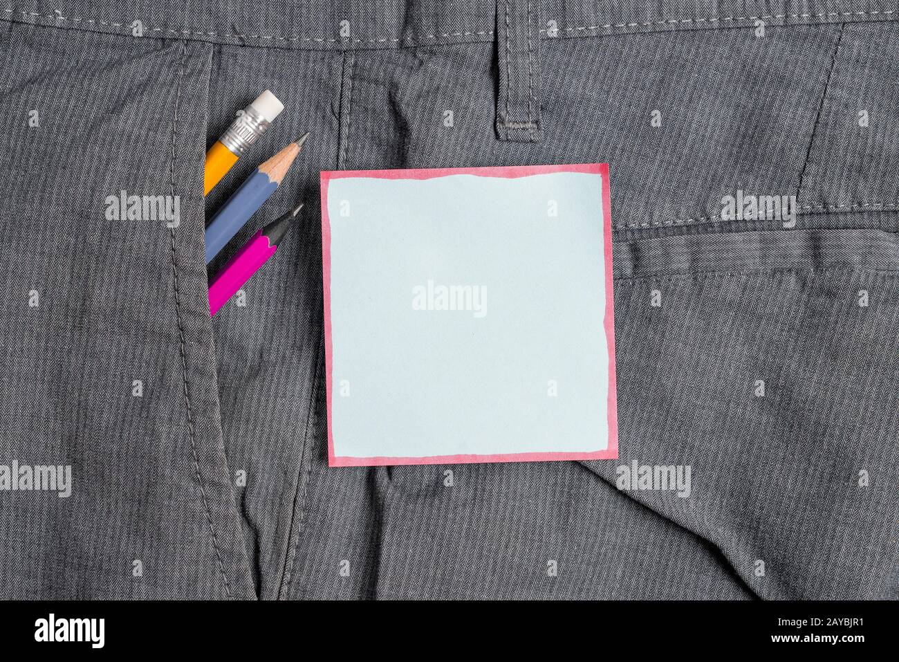 Writing equipment and a blue note paper inside the formal working ...