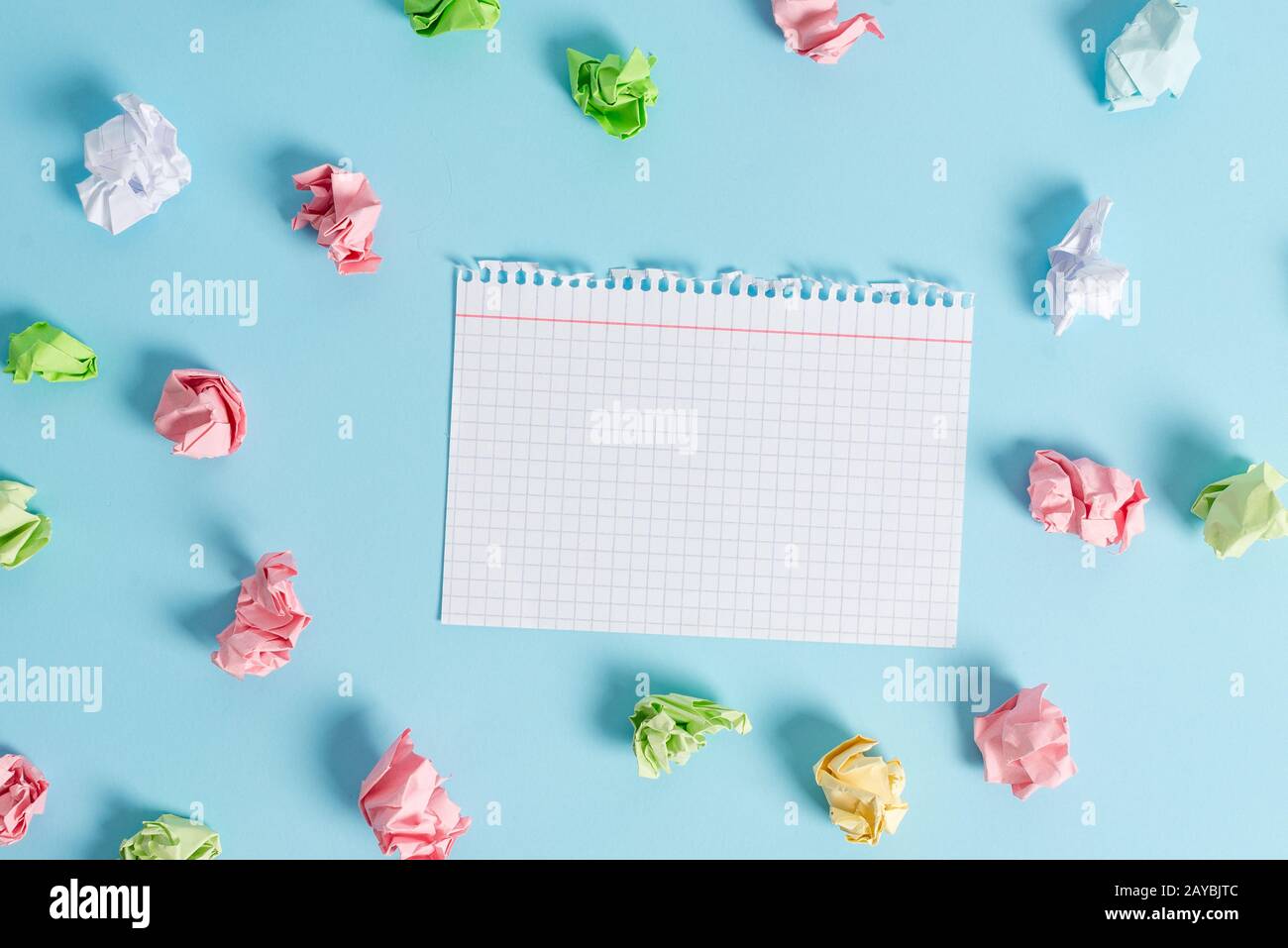 Rectangle square shaped colored paper in a light blue background ...