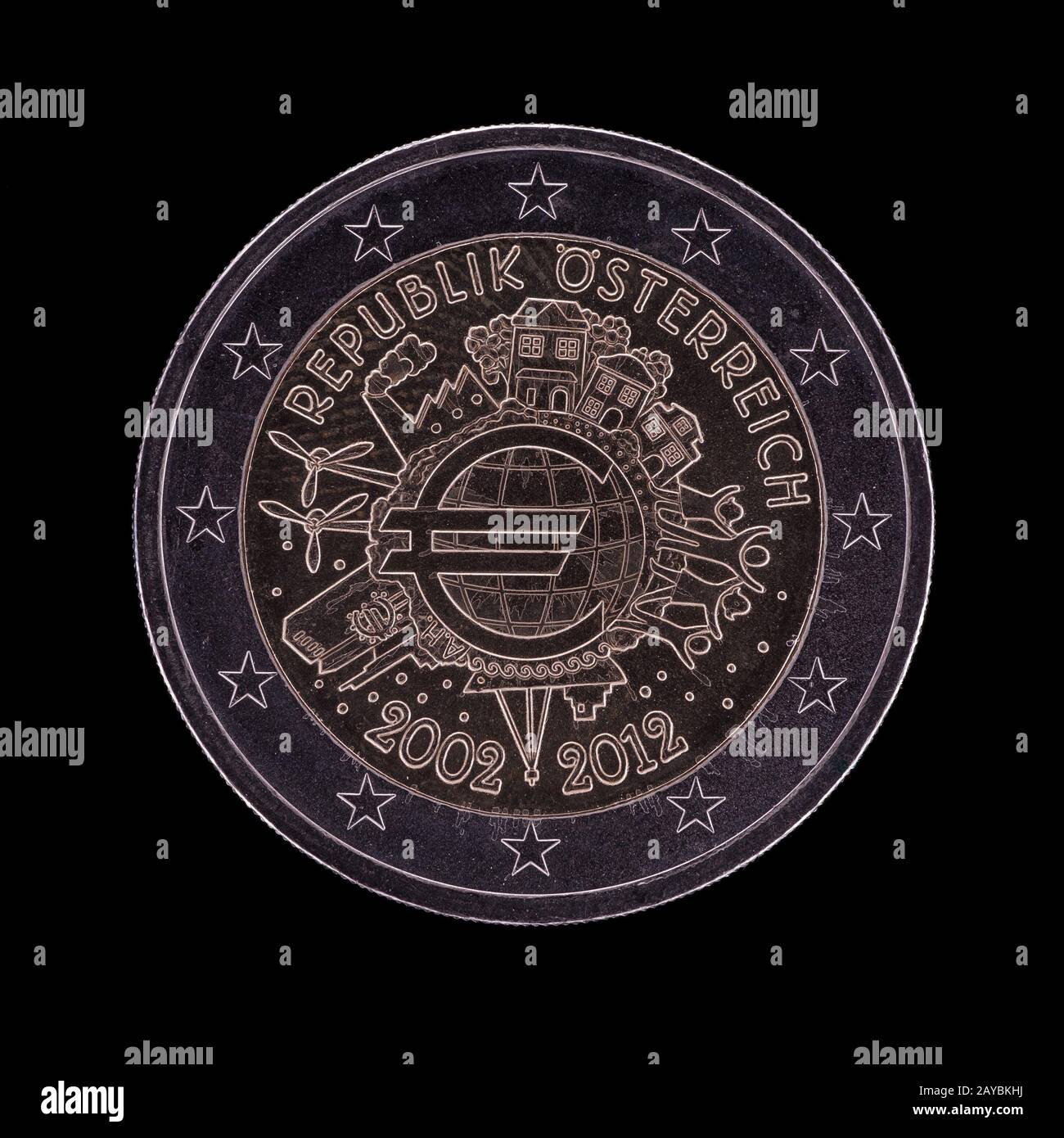 Austrian piece of a two Euro coin isolated on black background ...