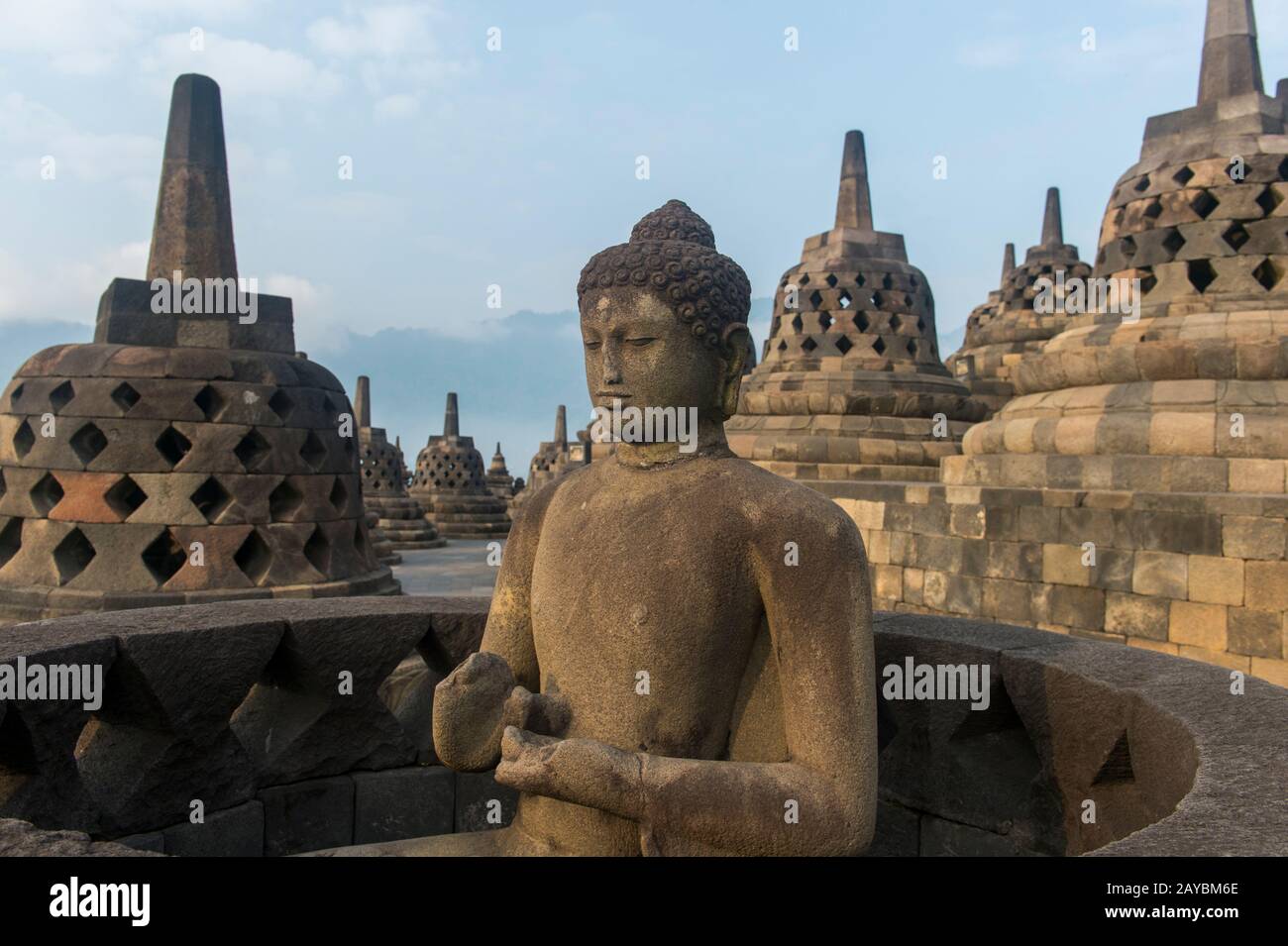 A Buddha statue on an upper platform of Borobudur temple (UNESCO World ...