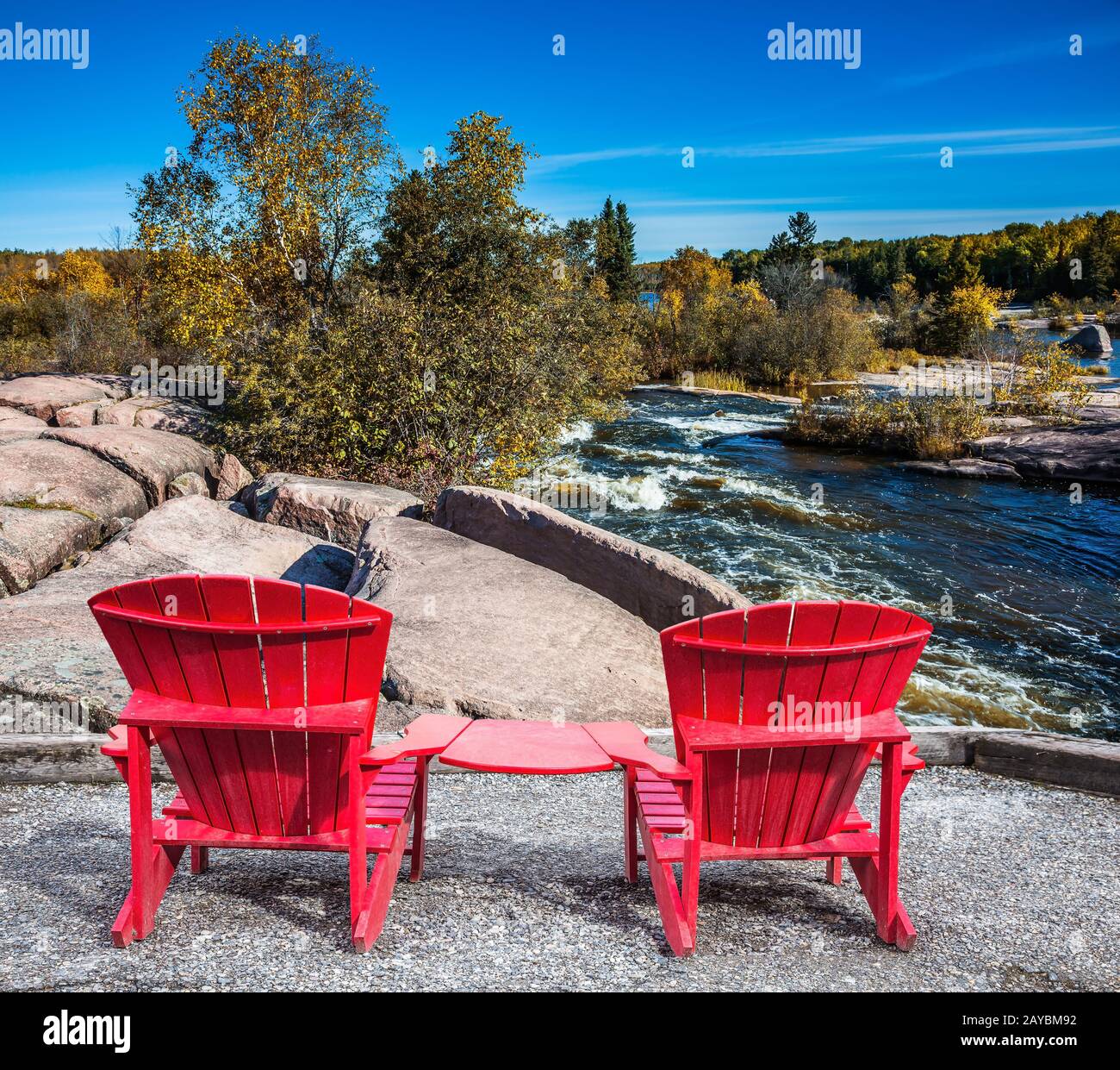 Two red beach chairs Stock Photo - Alamy