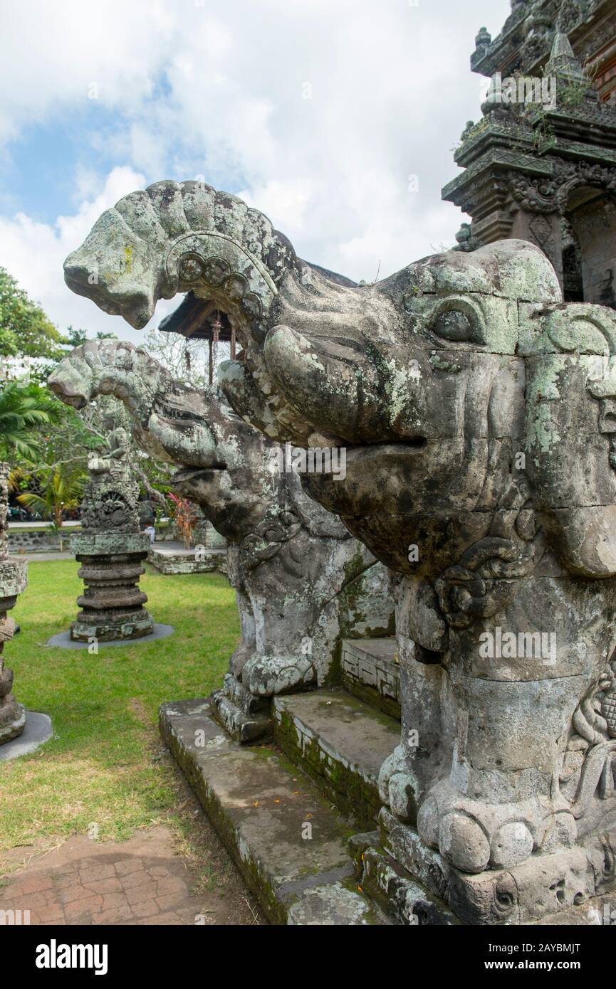 A traditional Balinese temple with elephant statues in Batubulan, Bali ...