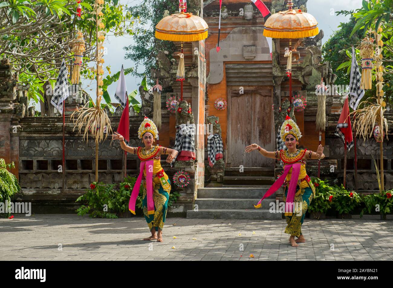 Women dancers during the Barong and Kris dance, which tells a battle ...