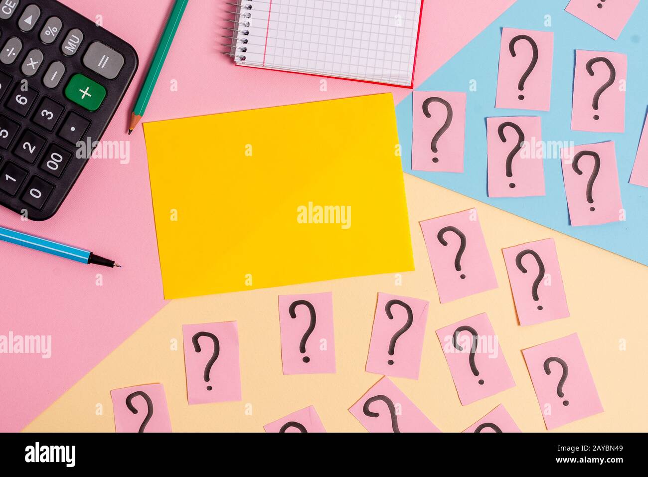 Math stuff with scribbled and crumbling papers plus writing equipment ...