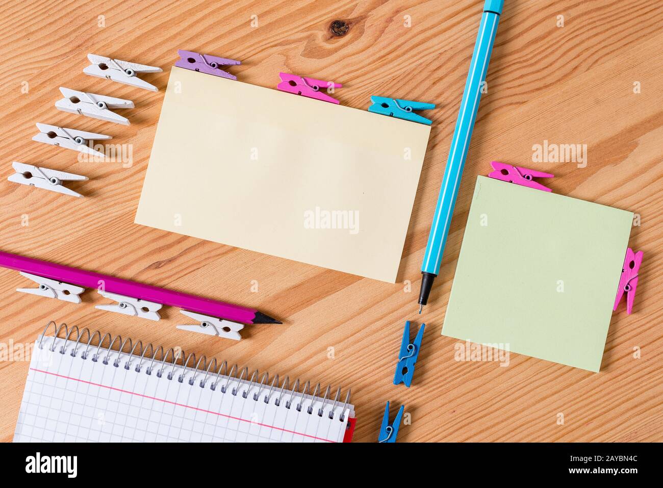 Colored clothespin placed around the empty rectangle square shaped ...