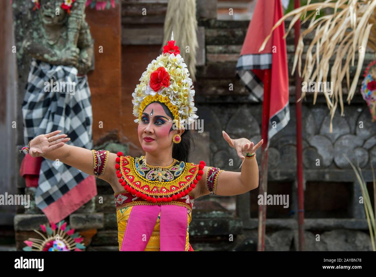 Female performer during the Barong and Kris dance, which tells a battle ...