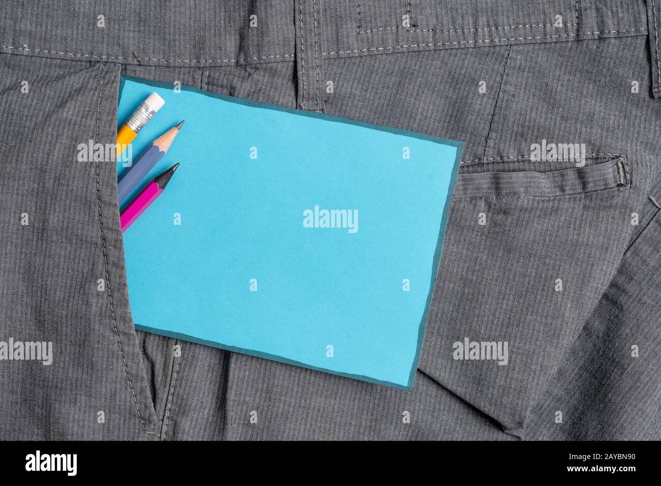 Writing equipment and a blue note paper inside the formal working ...