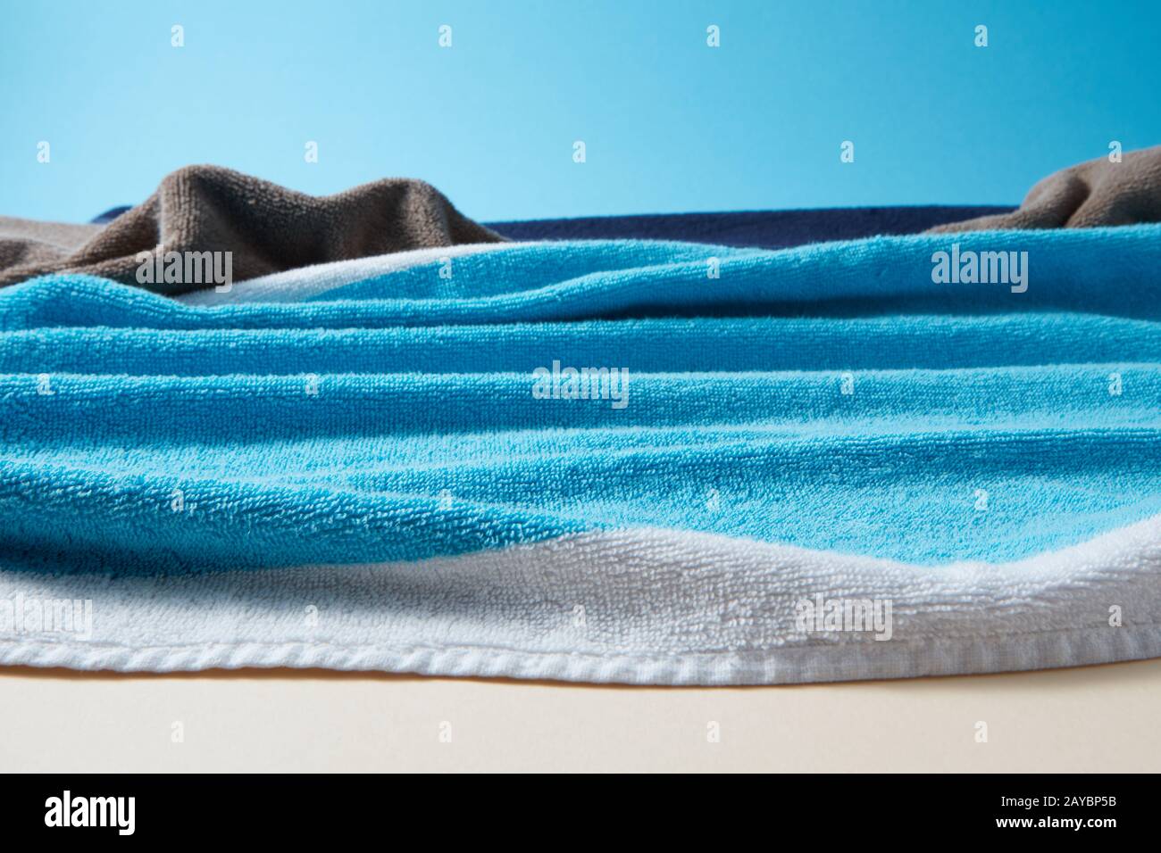 Handmade waves of blue sea made from beach terry towels Stock Photo - Alamy