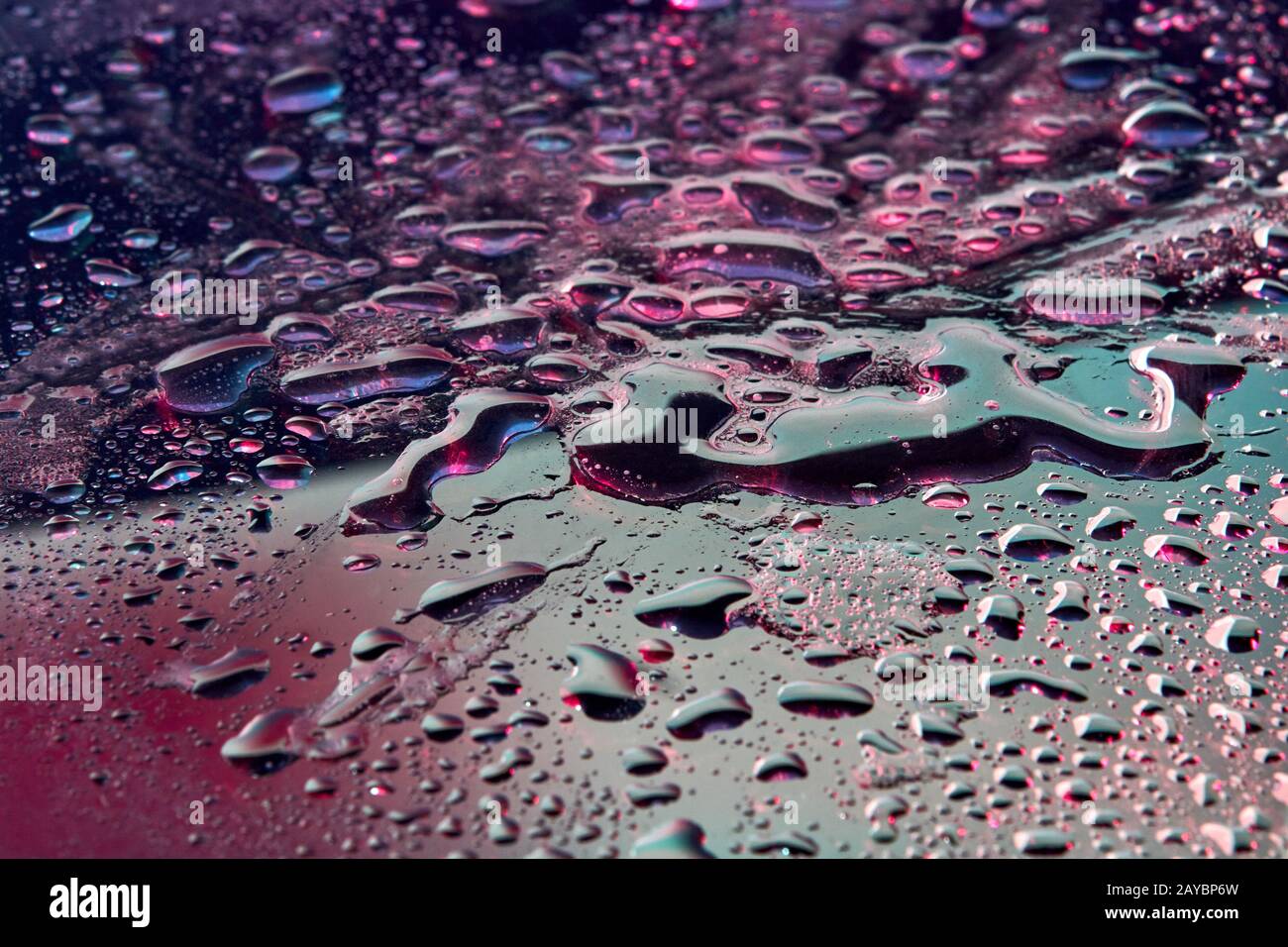 Abstract close-up water background with neon lights Stock Photo - Alamy