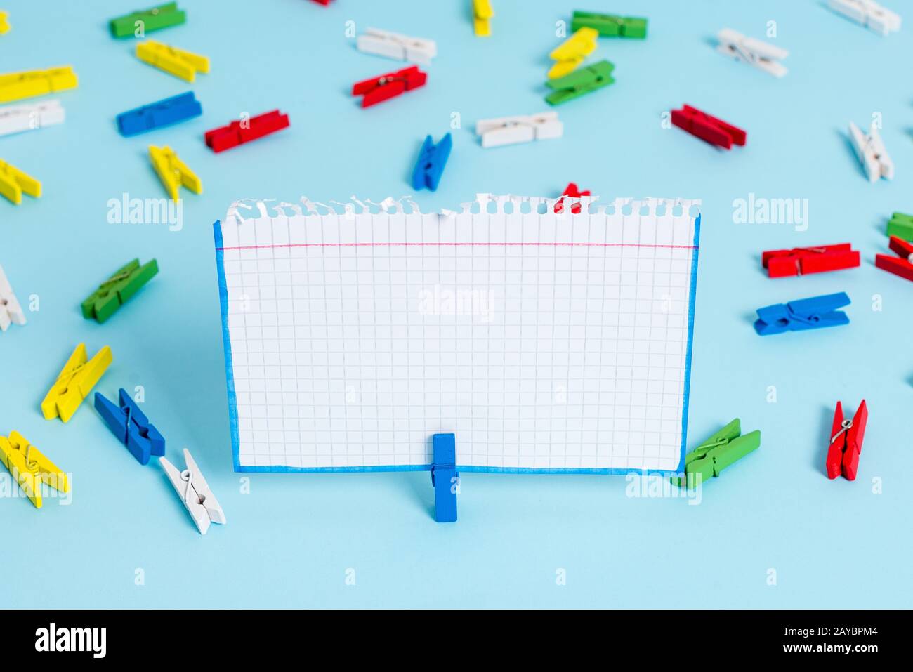 Colored clothespin placed around the empty rectangle square shaped ...