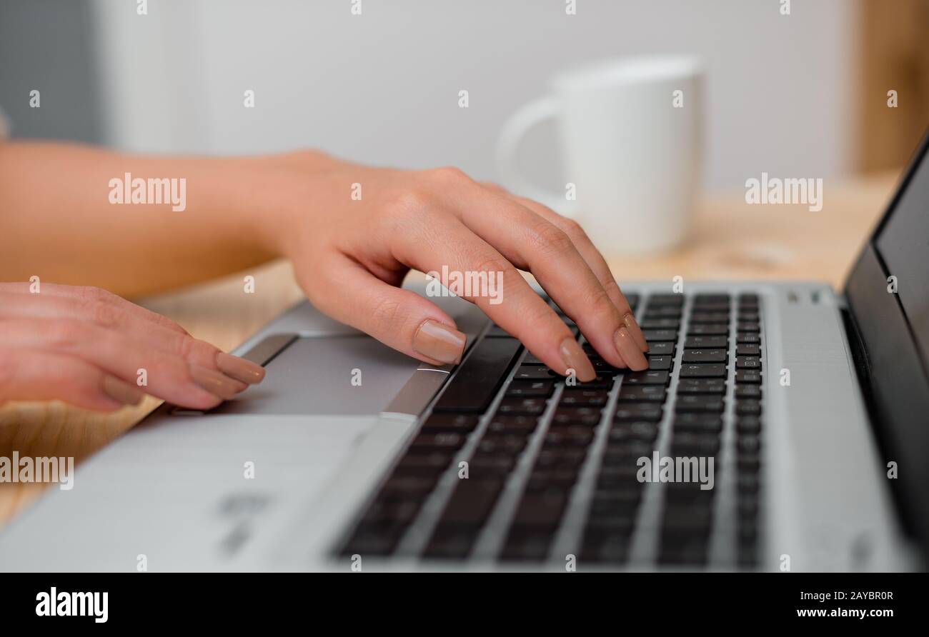 Black woman typing at computer hi-res stock photography and images - Alamy