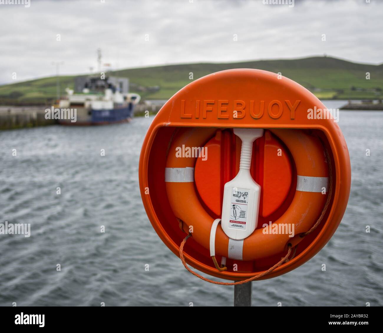 Life bouy at harbour of dingle Stock Photo - Alamy