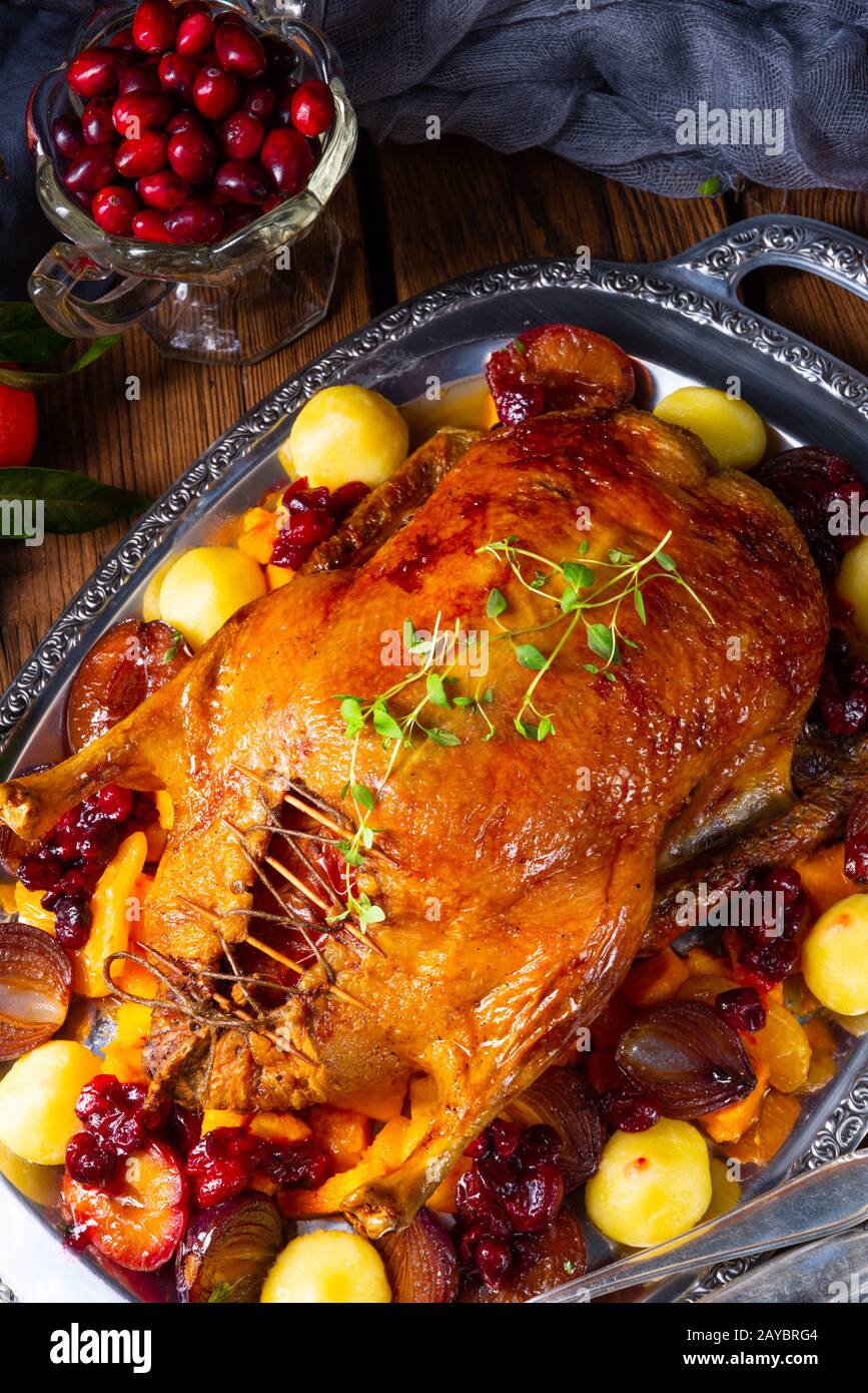 roast duck with potato dumplings and plums Stock Photo - Alamy