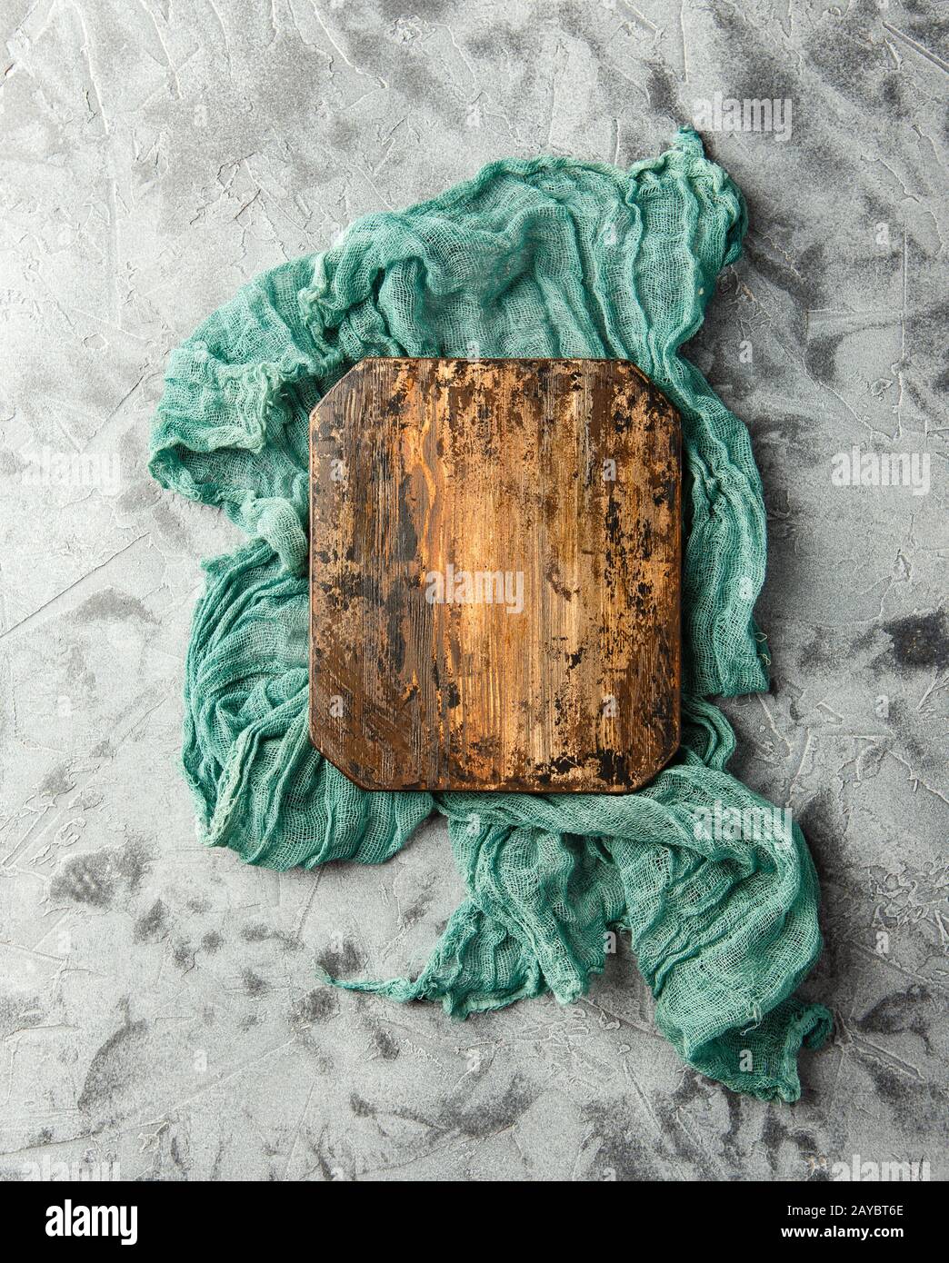 Cutting board over metal table background. Cooking backdrop. Top view ...