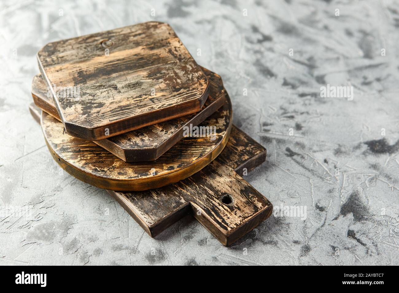 Set of different old wooden chopping boards Stock Photo - Alamy