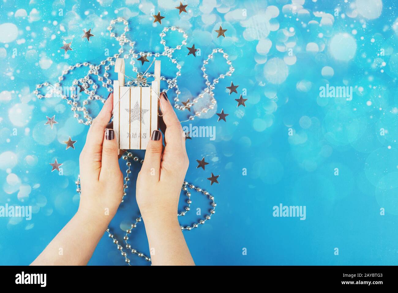 Hand pulls small wooden sledges Stock Photo - Alamy