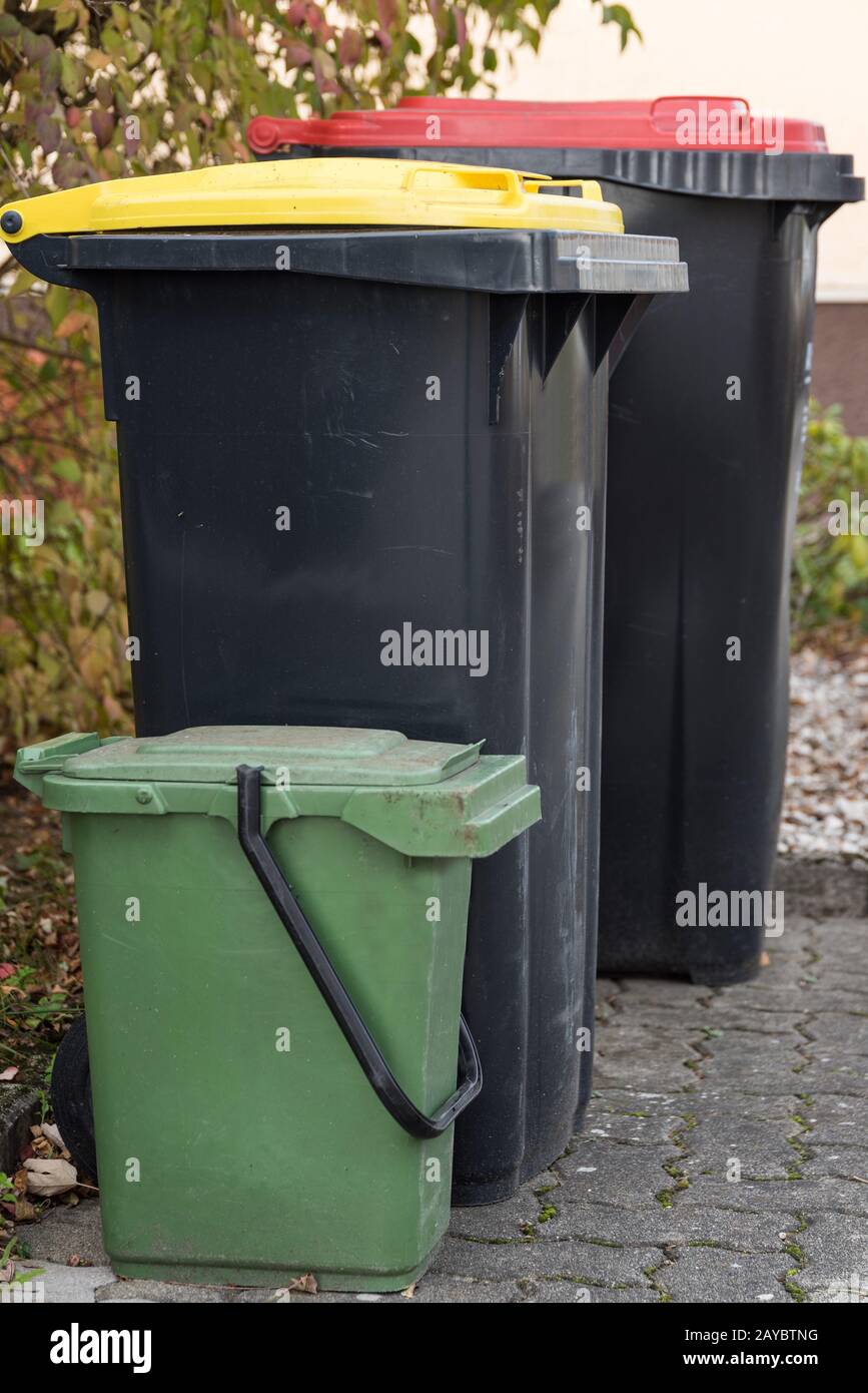 Dustbins in different colors for waste separation Stock Photo - Alamy