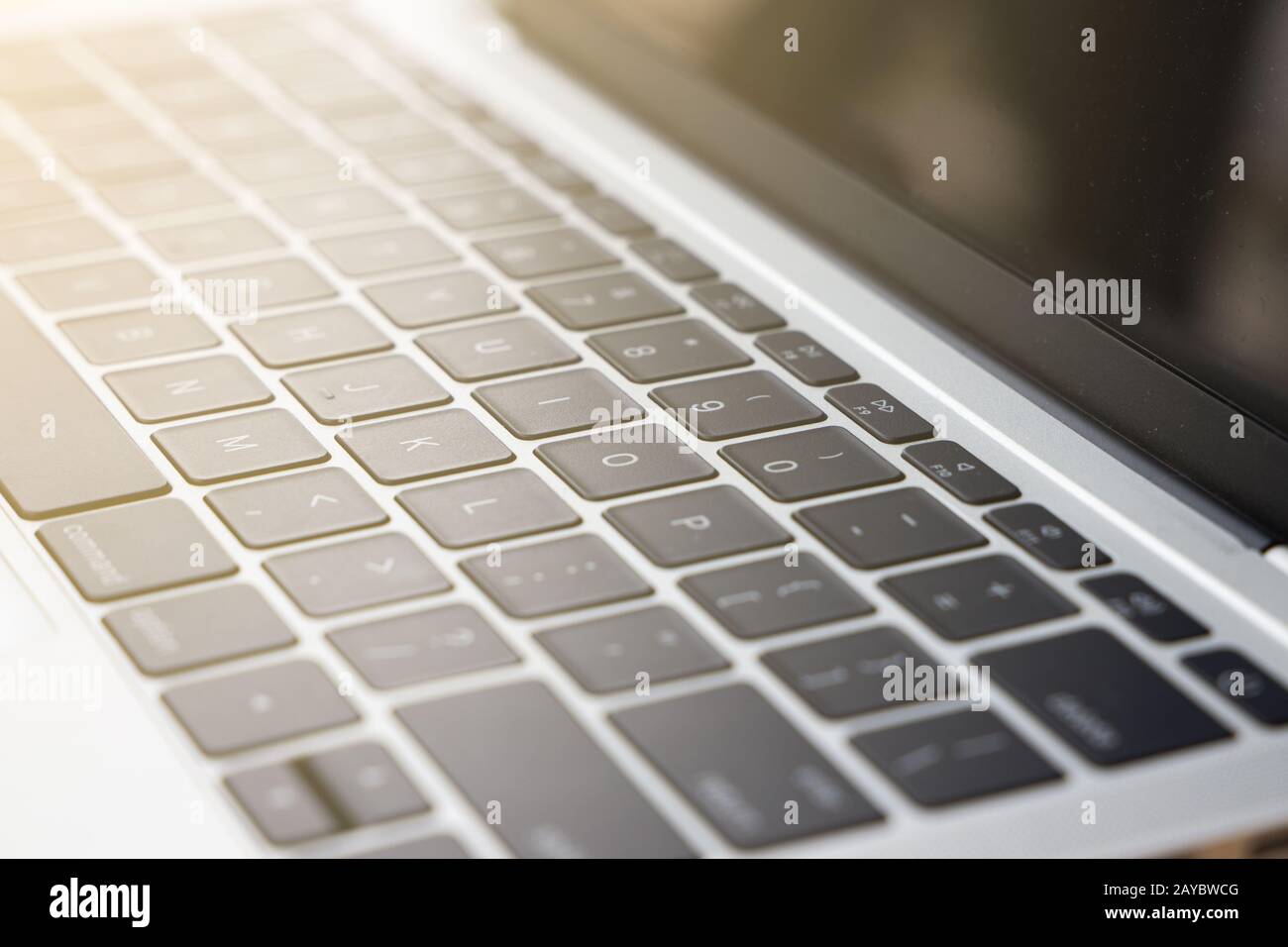 Close up selective focus laptop keyboard with white letter on black ...
