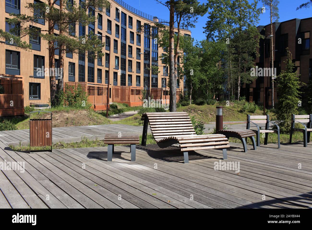 wooden boardwalk bench in the foreground Stock Photo - Alamy