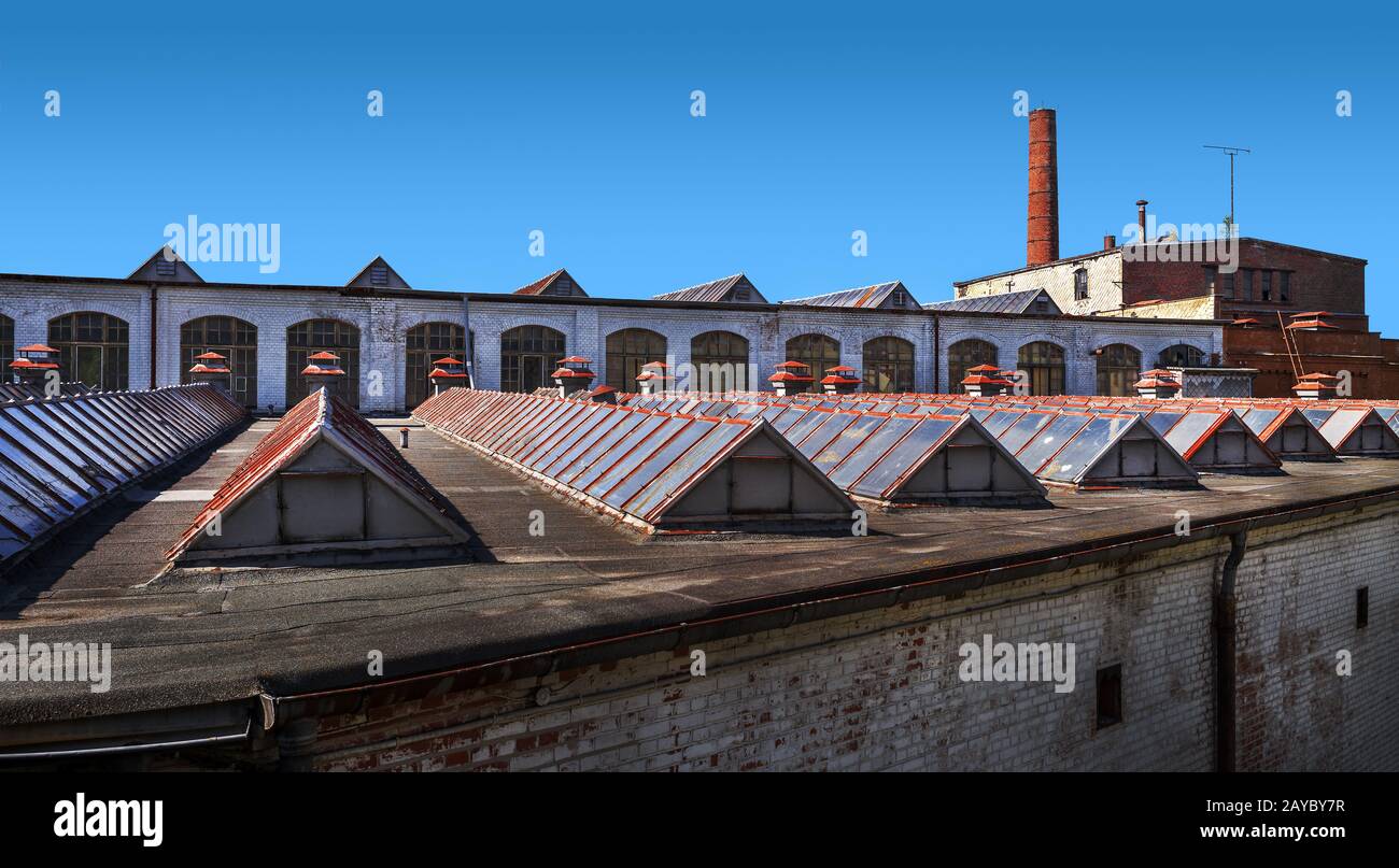 The roofs of the old factory Stock Photo - Alamy