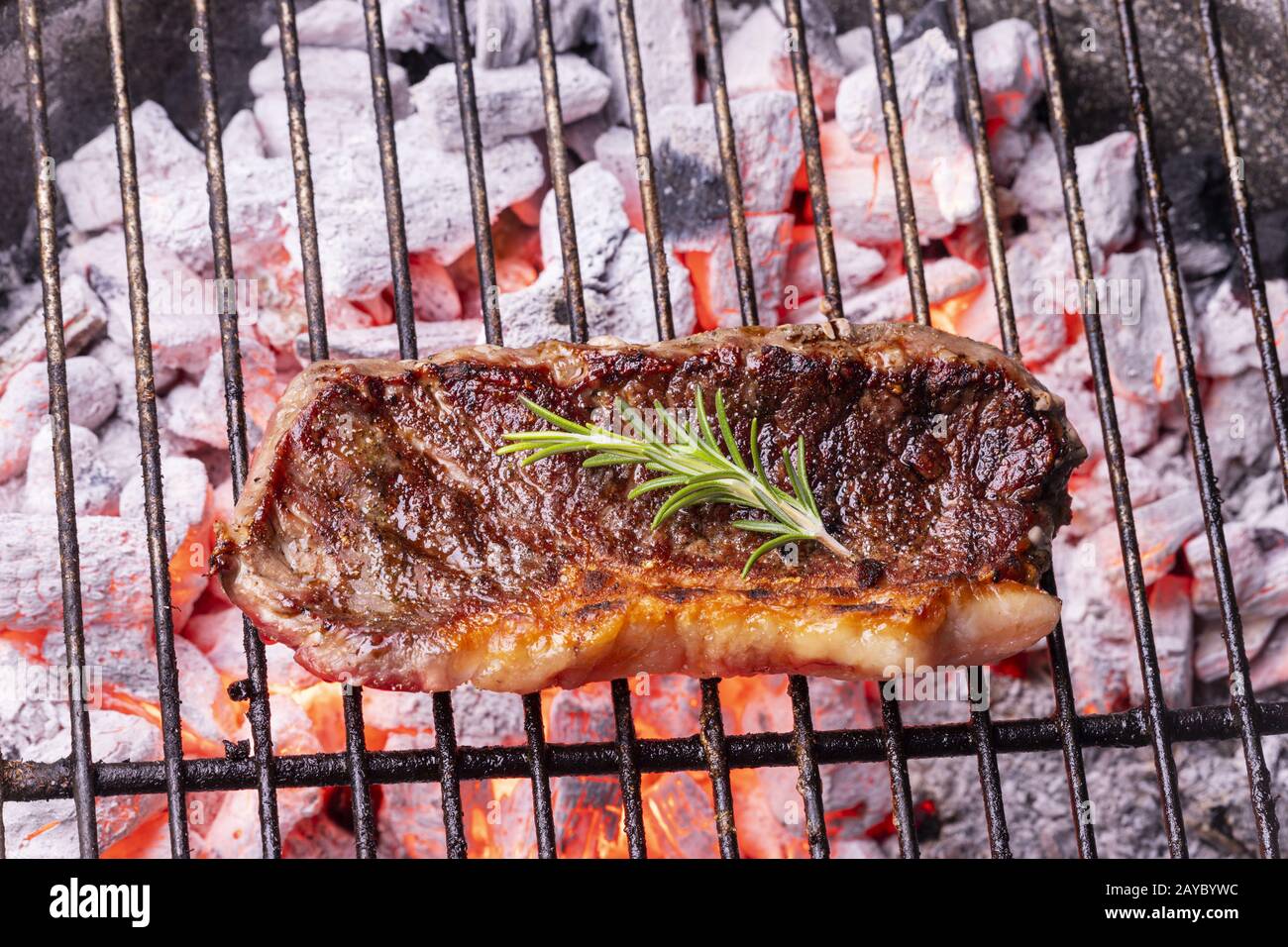 Steak ready for grilling Stock Photo - Alamy