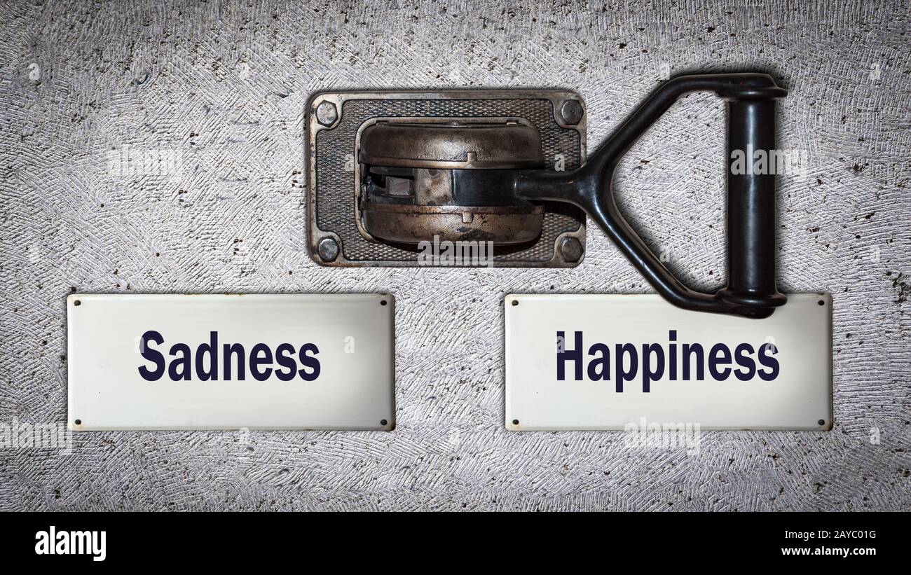 Wall Switch Happiness versus Sadness Stock Photo - Alamy