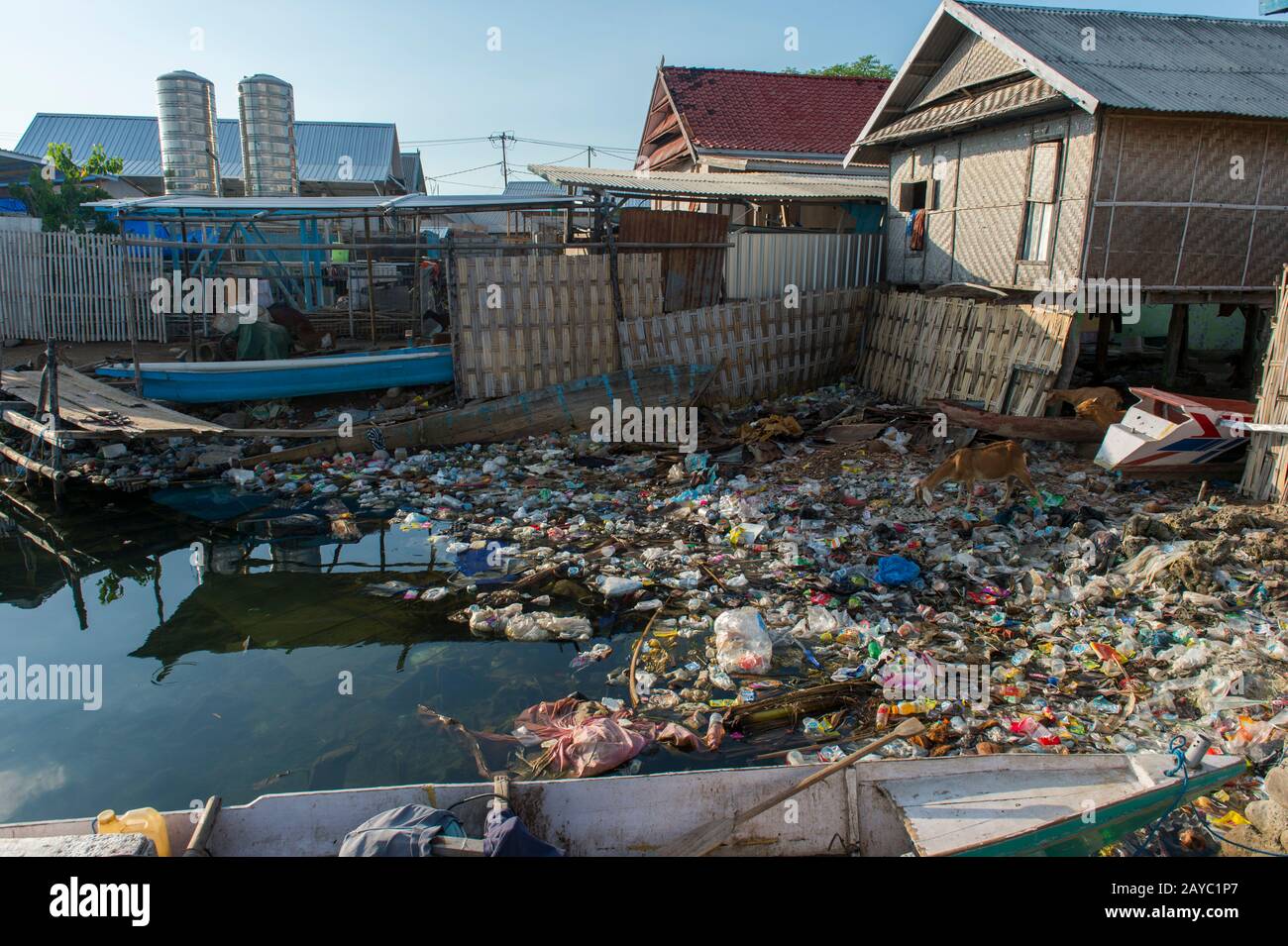 Garbage, mostly plastic, floating on the water at the Bajau Sea Gypsy ...