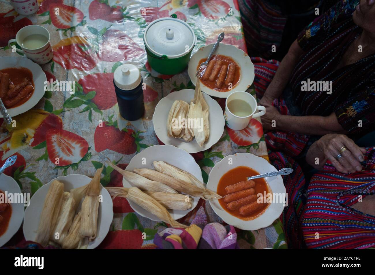 Maya indigenous women at table for lunch provide by NPO in San Jorge La ...