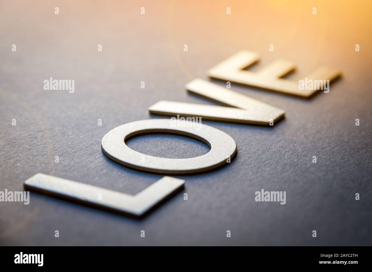 Word love written with white solid letters Stock Photo - Alamy