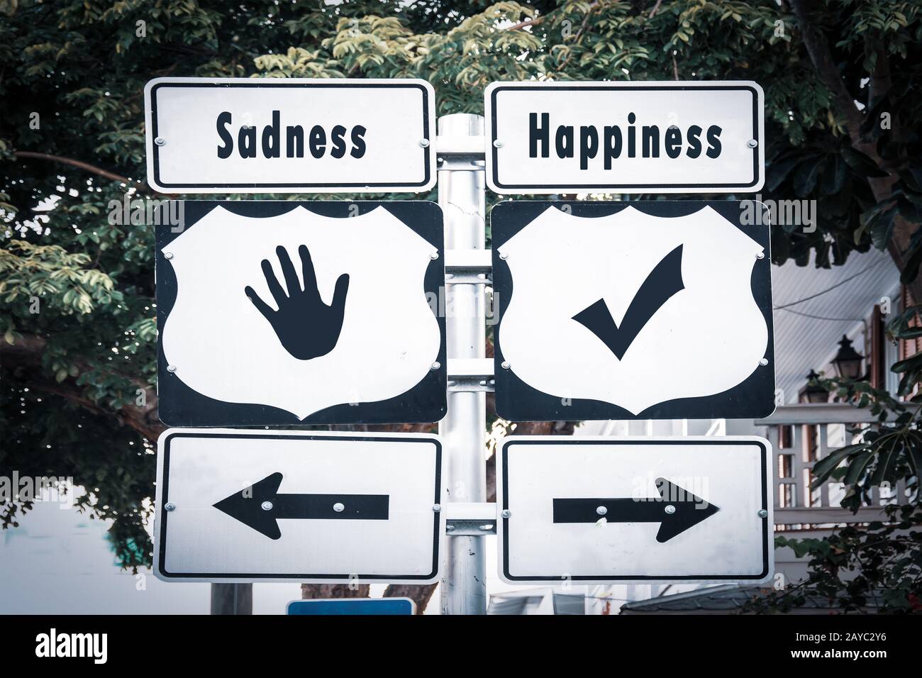 Street Sign Happiness versus Sadness Stock Photo - Alamy