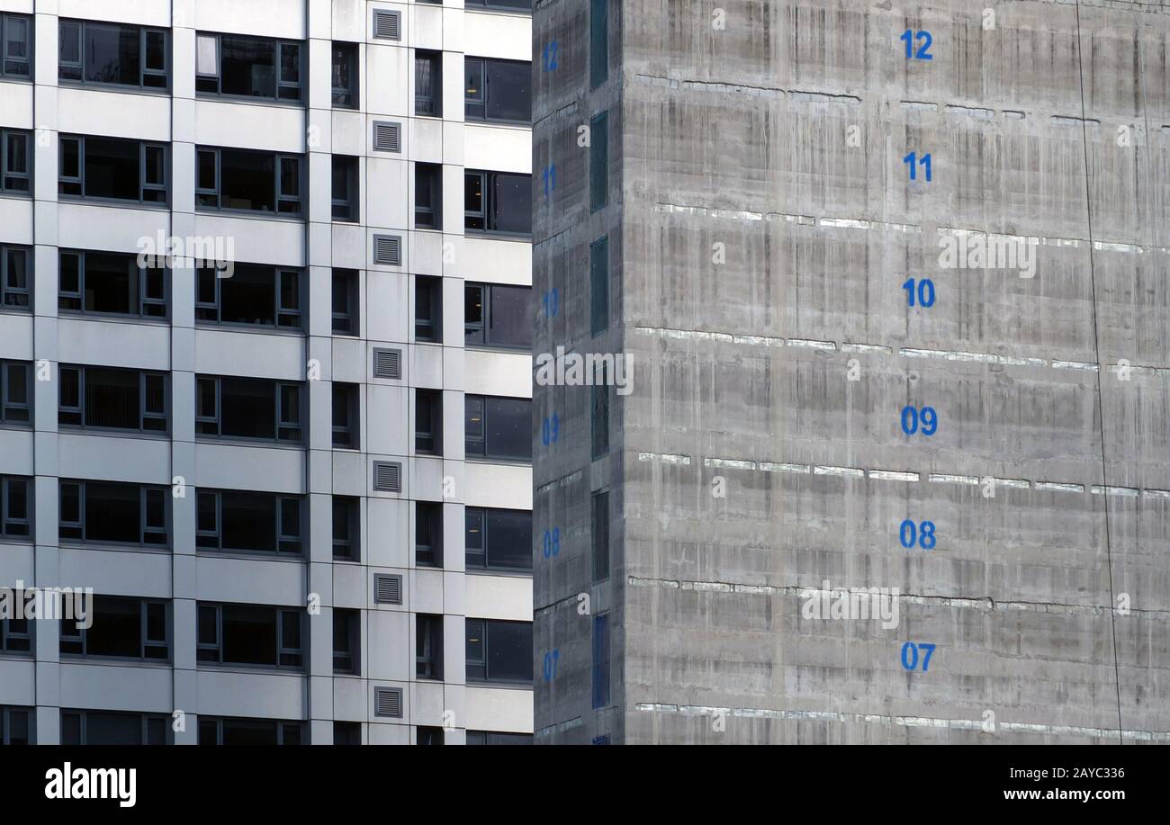 the concrete core of a tall apartment building under construction with ...