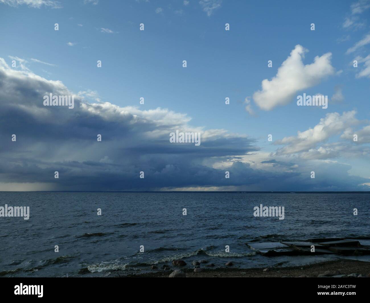 rain clouds over the sea Stock Photo - Alamy