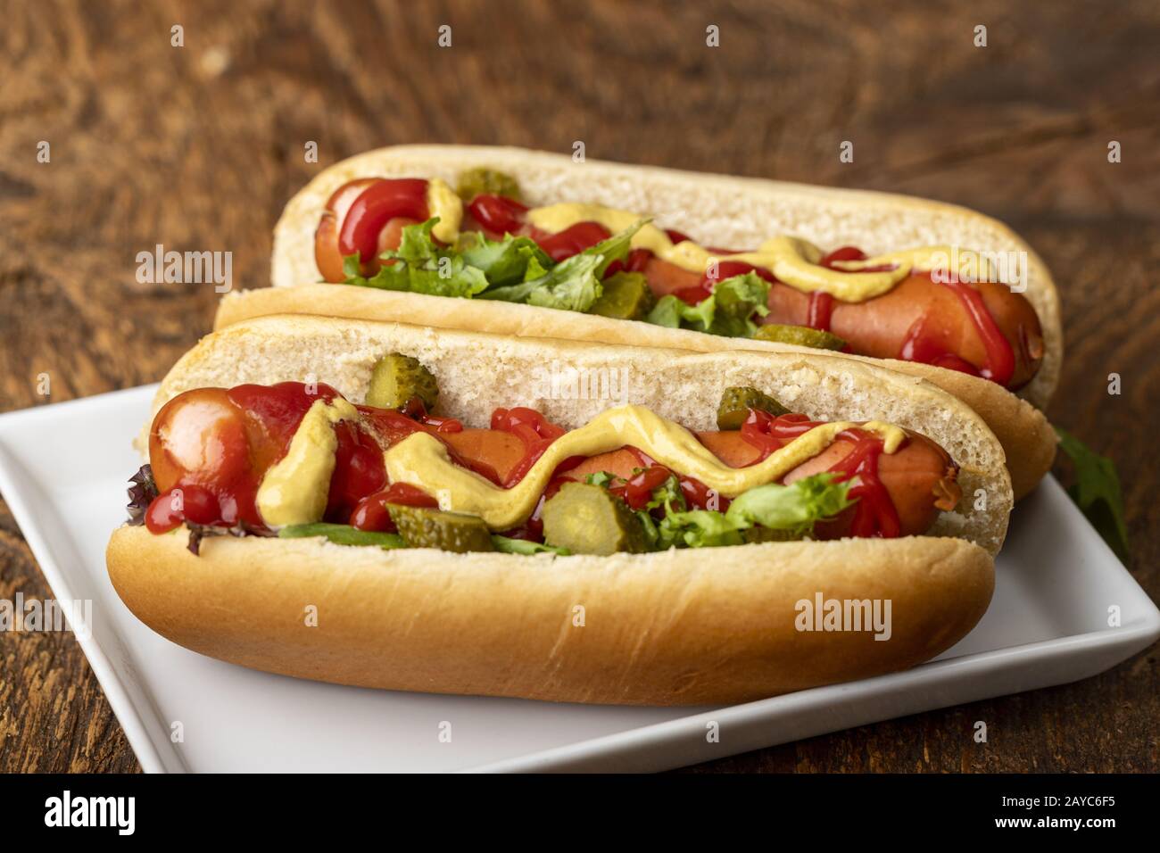two classic hot dogs in rolls Stock Photo - Alamy