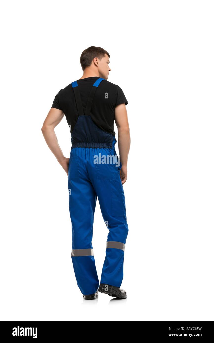 Man in work clothes isolated rearview Stock Photo - Alamy