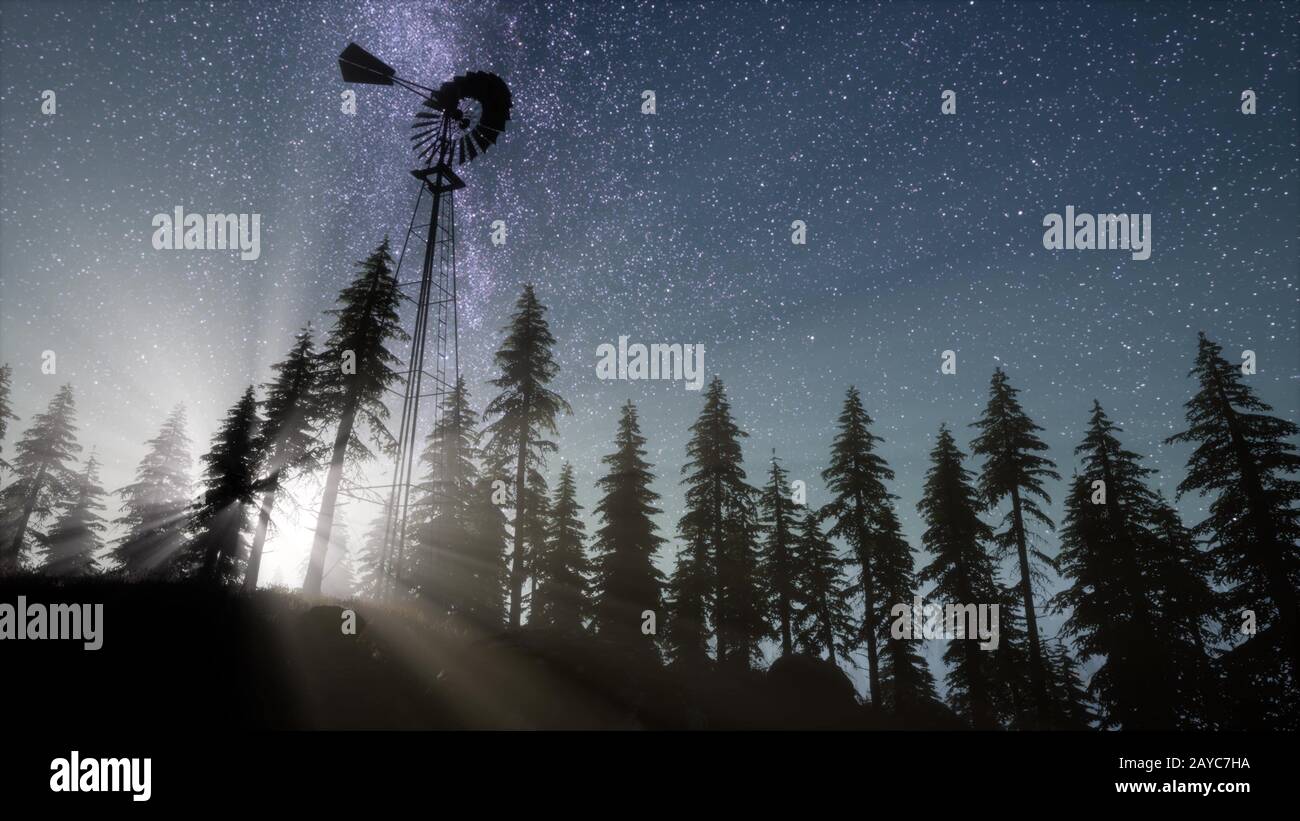 retro windmill in mountain forest with stars. hyperlapse Stock Photo ...