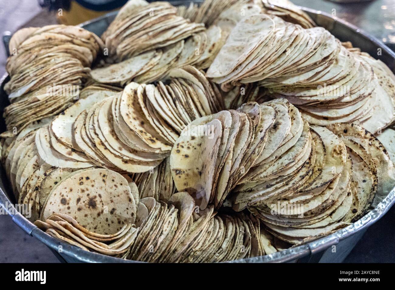 Big bowl of chapati - traditional Indian bread at the Golden Temple ...